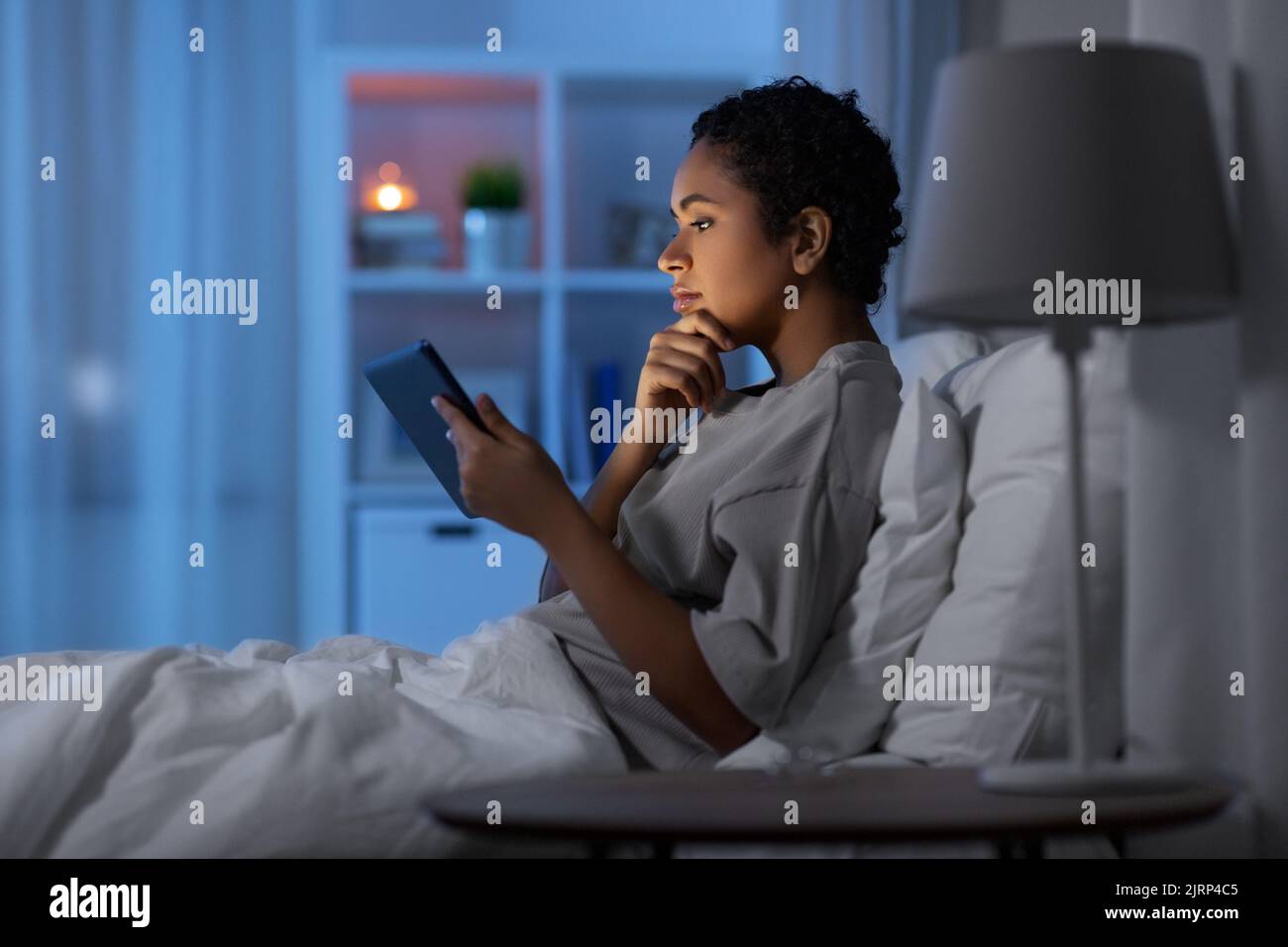 Suspicious woman and computer hi-res stock photography and images - Alamy