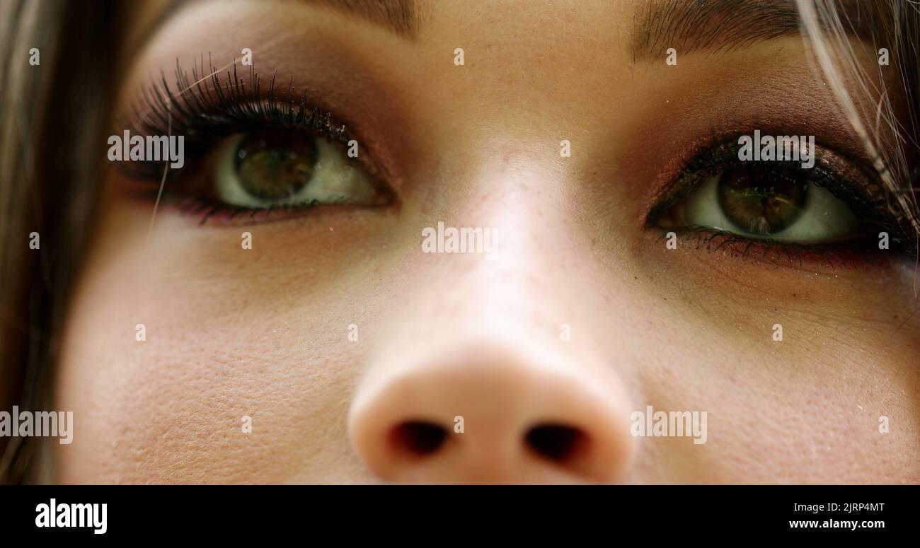 Closeup of girl face, eyes nose macro looking in the horizon Stock ...