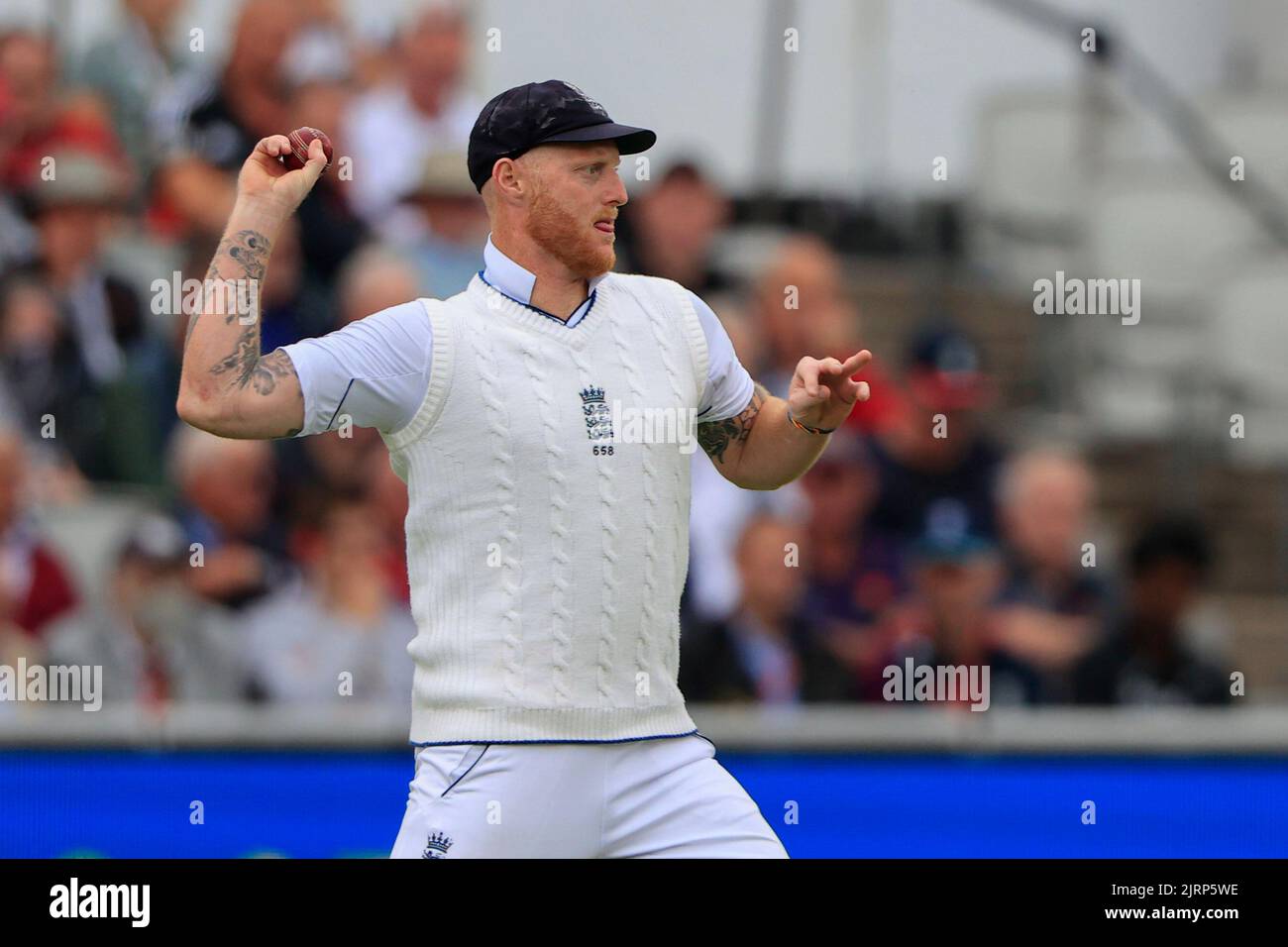 Ben Stokes of England throws the ball back to the wicketkeeper Stock ...