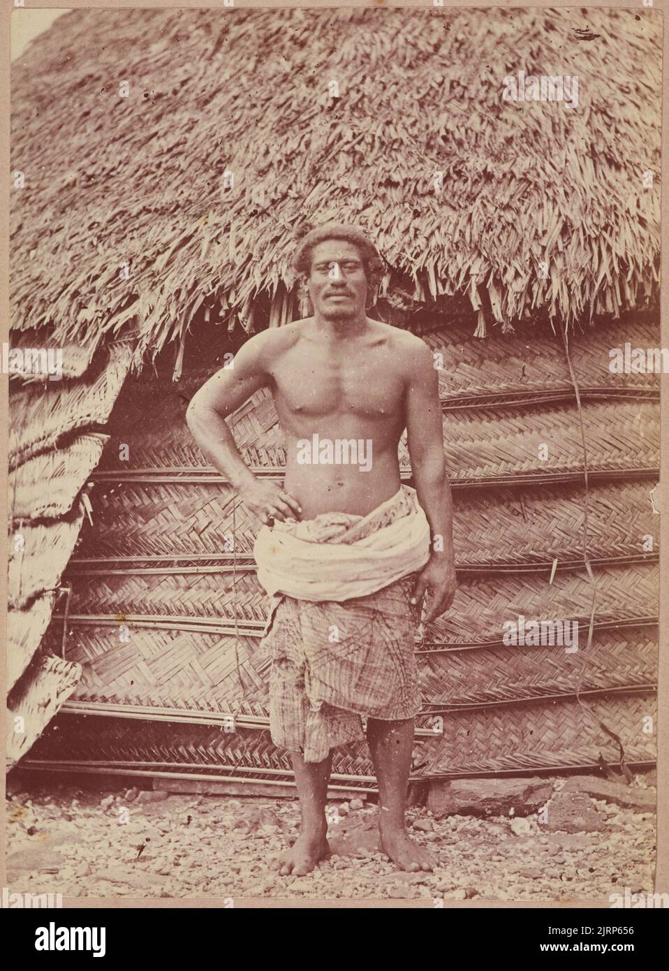 Man standing outside fale. From the album: Tahiti, Samoa and New ...