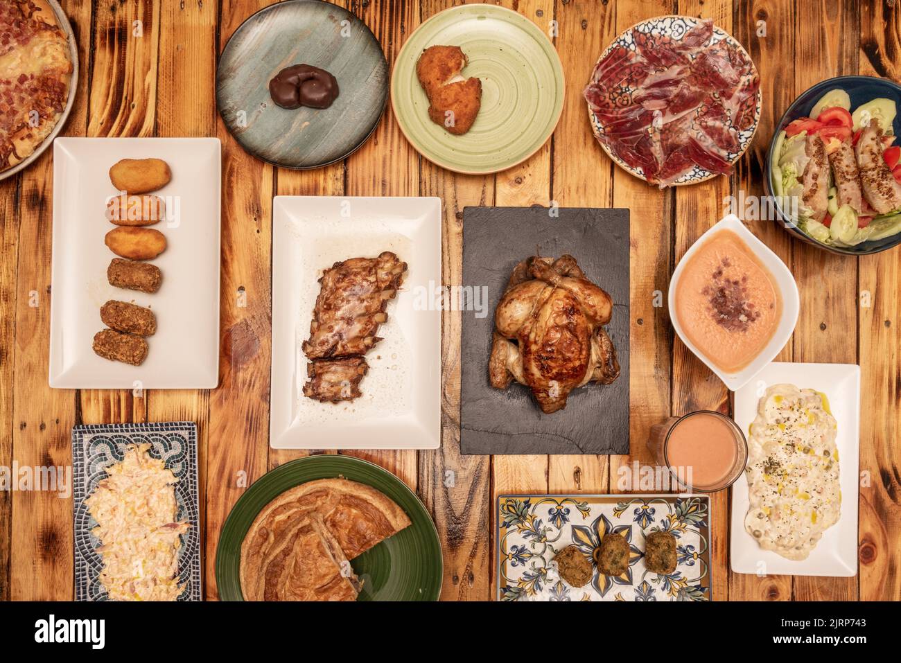 Set of fast food dishes and typical Spanish tapas, alioli potatoes ...