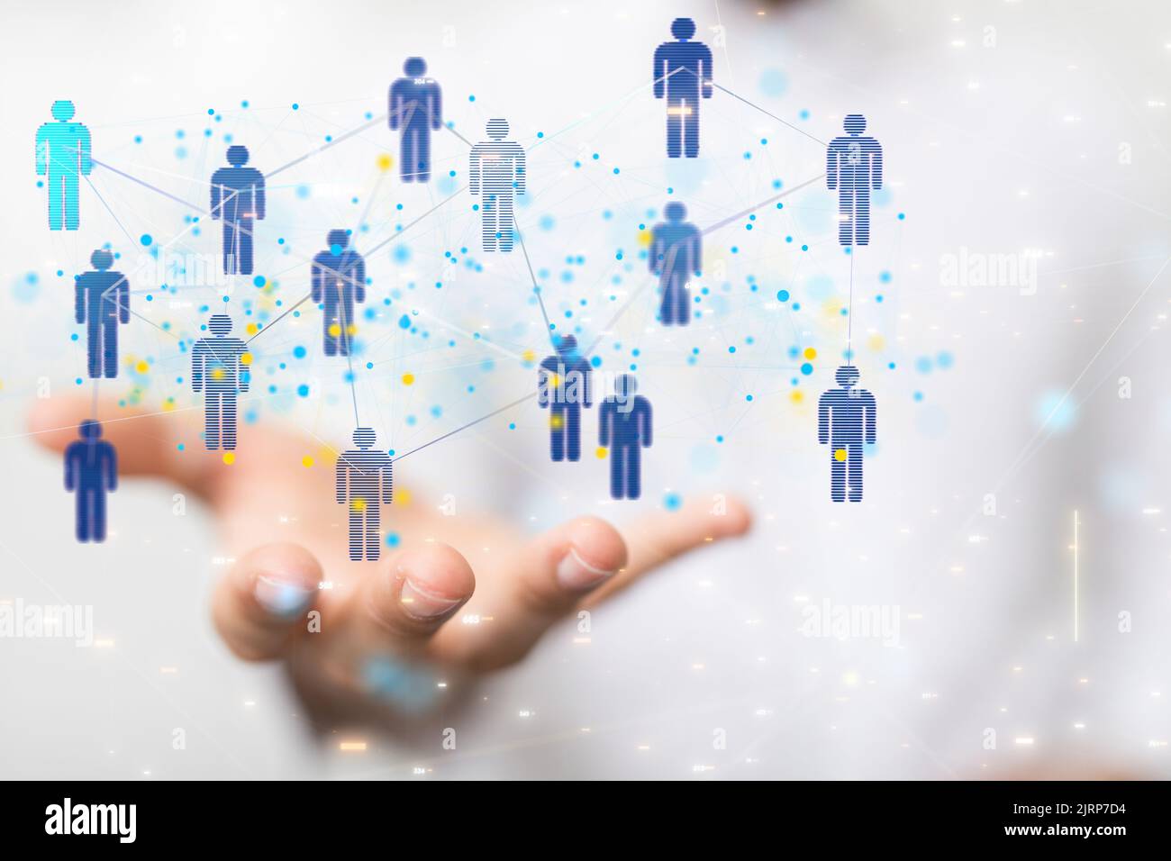 A 3d floating digital illustration of connected human icons over a hand ...