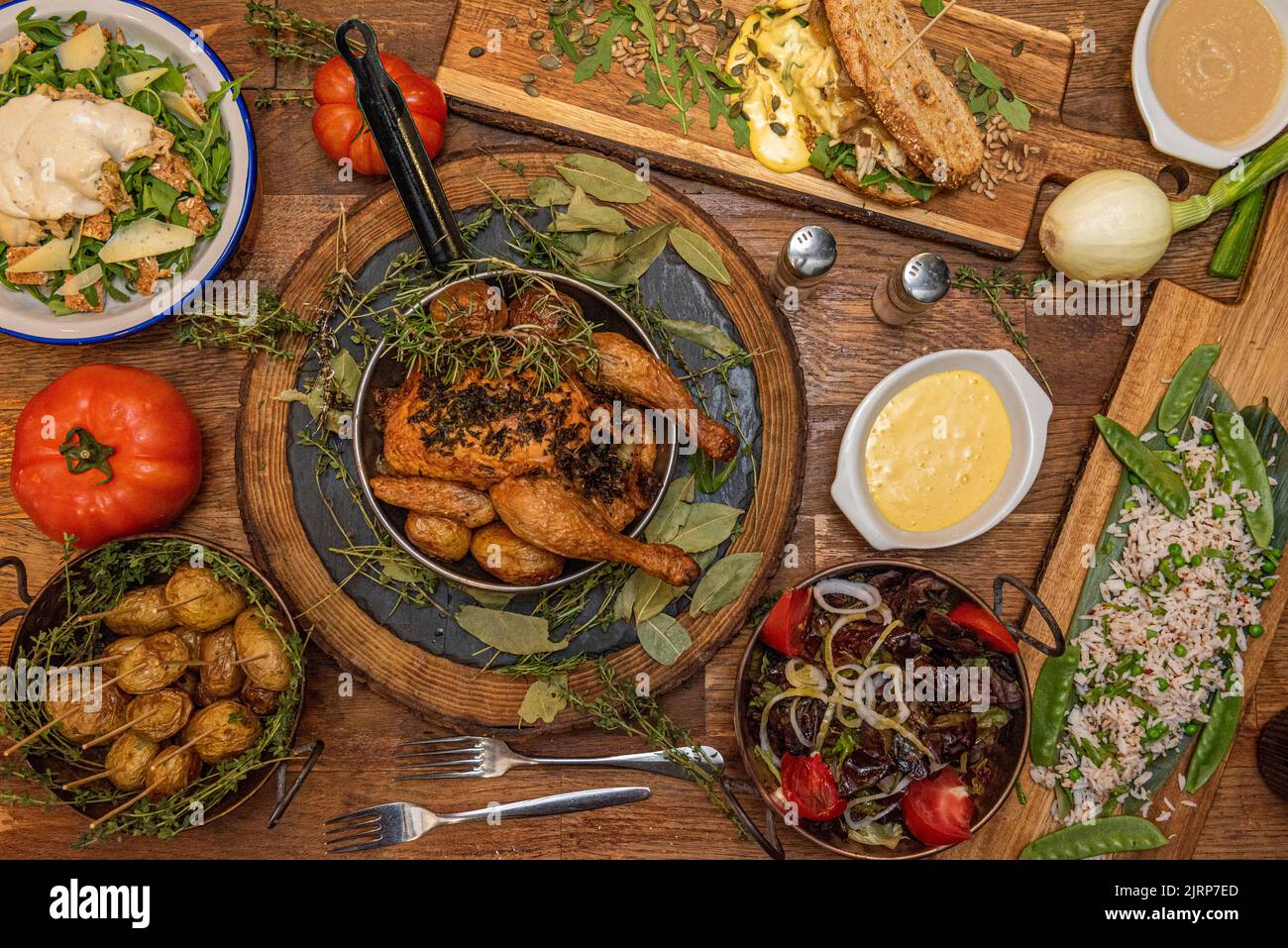 Superb charcoal grilled chicken surrounded by spices, wrinkled potatoes ...