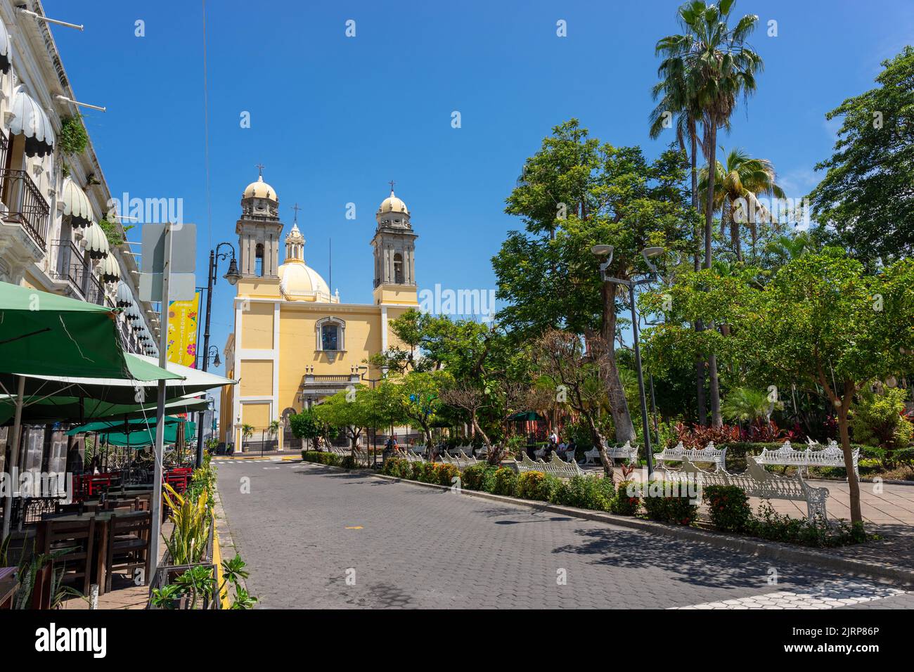 Colonial church and government palace of Colima. Central Garden at ...