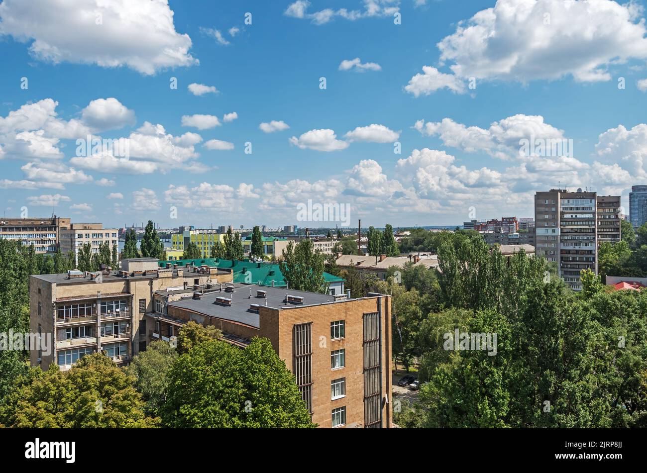 Birds eye view of city rooftops high-rise buildings against backdrop of ...