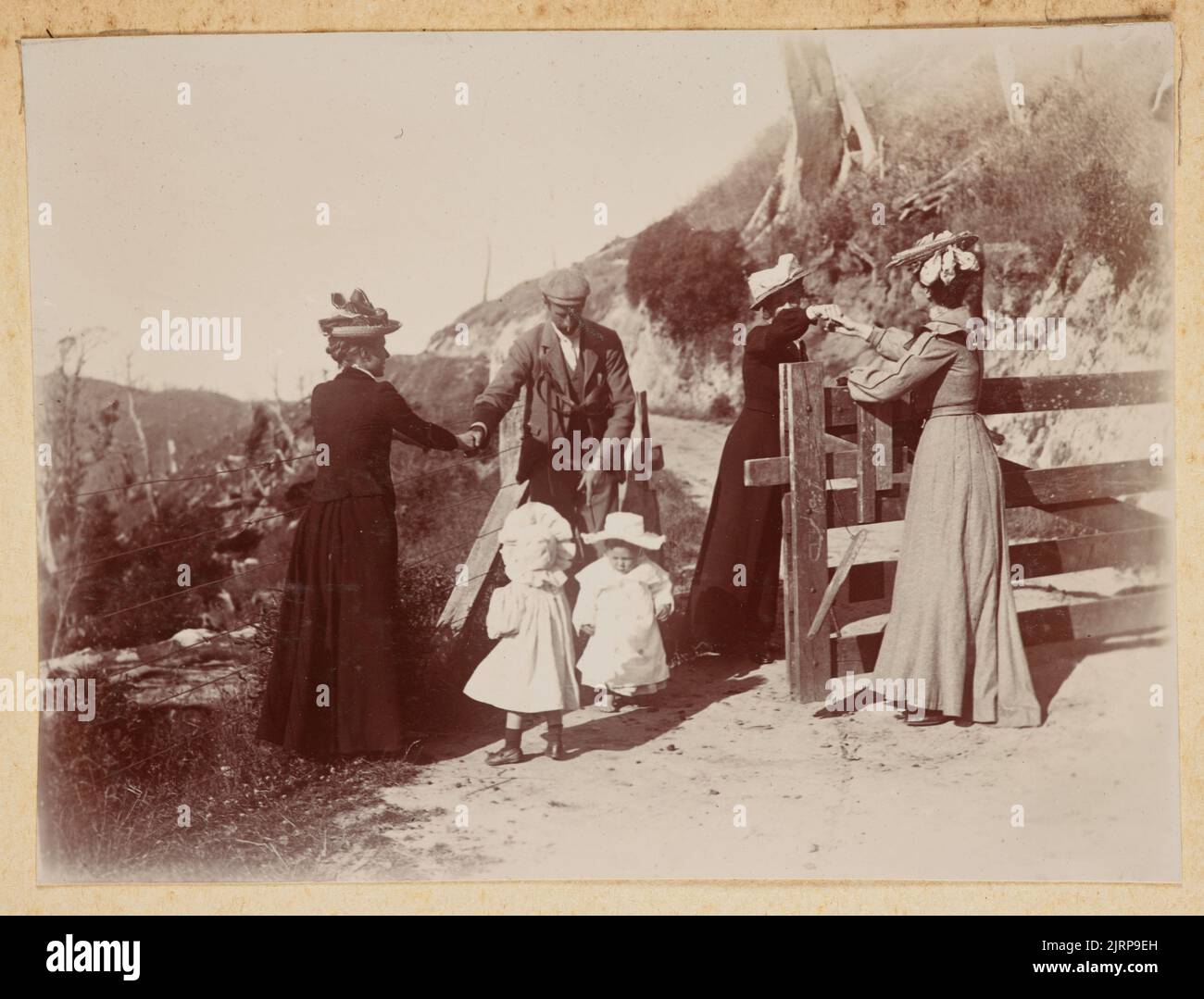 Group portrait. From the album: Snapshot album - Nga Mahanga, circa 1900, Manawat River, maker ...