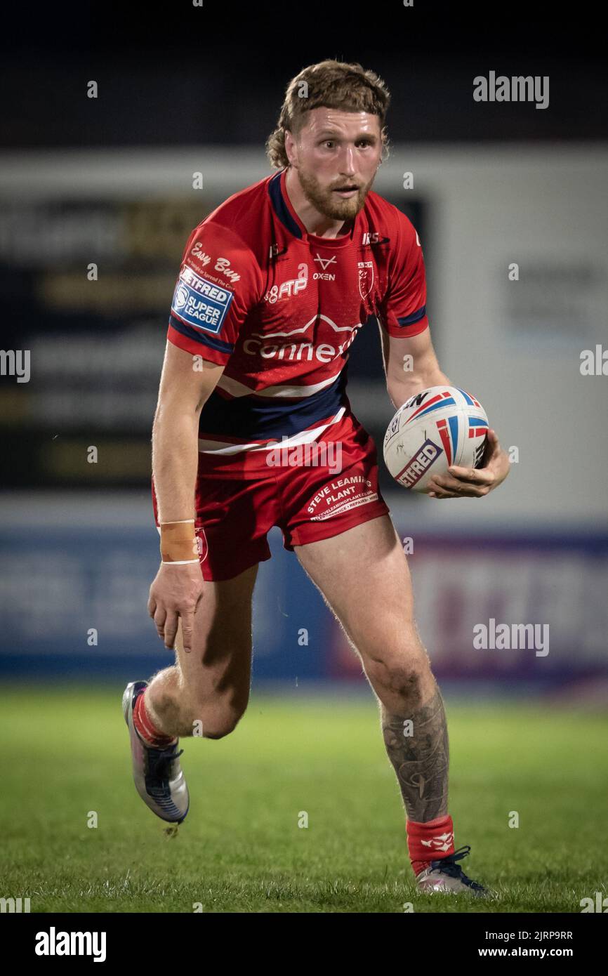 Ethan Ryan #23 of Hull KR runs with the ball during the game Stock ...
