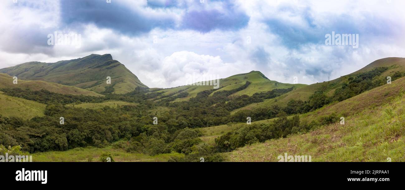 Scenic view of mountains and clouds above the peaks in Western Ghats ...
