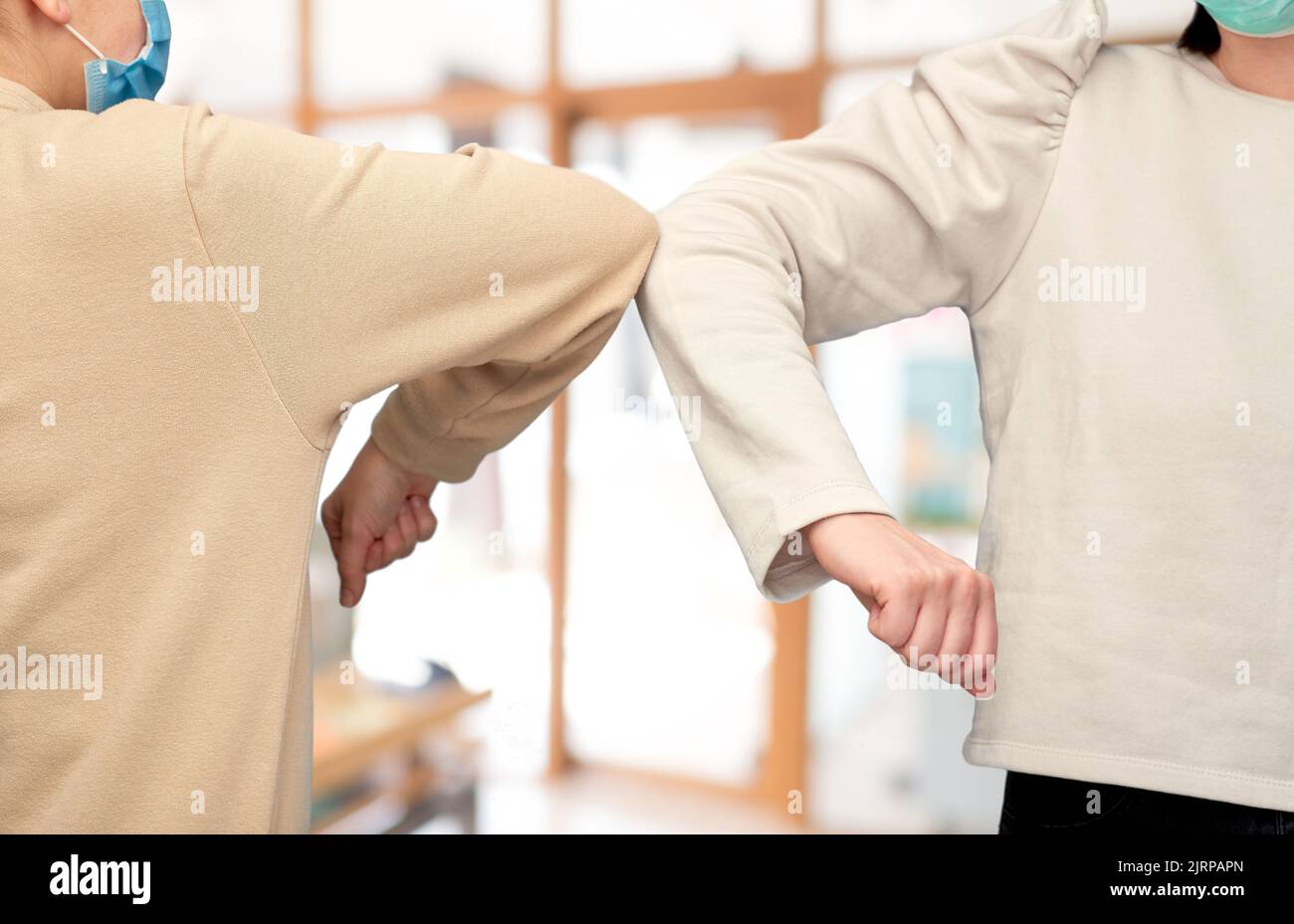 Elbow bump business hi-res stock photography and images - Alamy