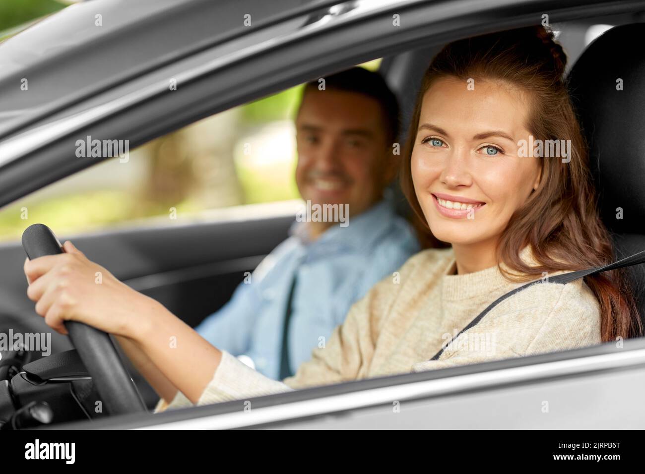 car driving school instructor teaching woman Stock Photo - Alamy