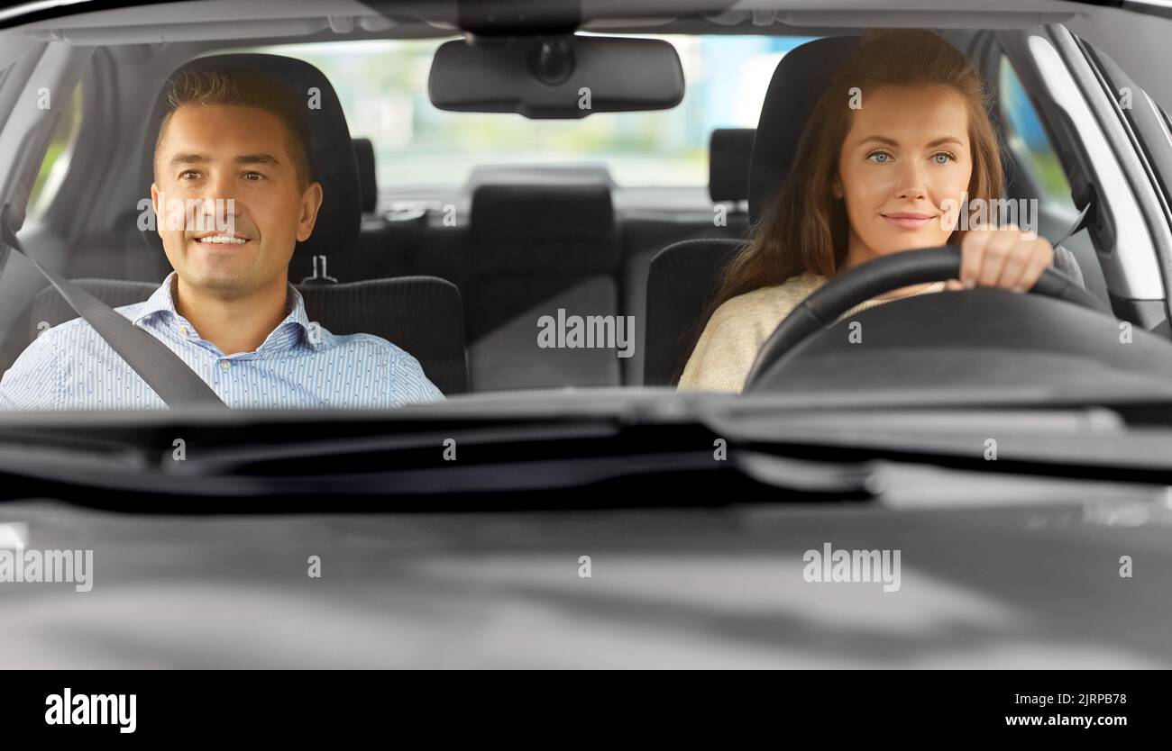 car driving school instructor teaching woman Stock Photo - Alamy