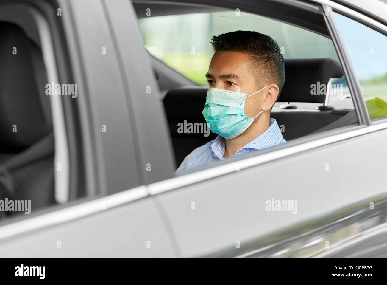 Man passenger in protective hi-res stock photography and images - Alamy
