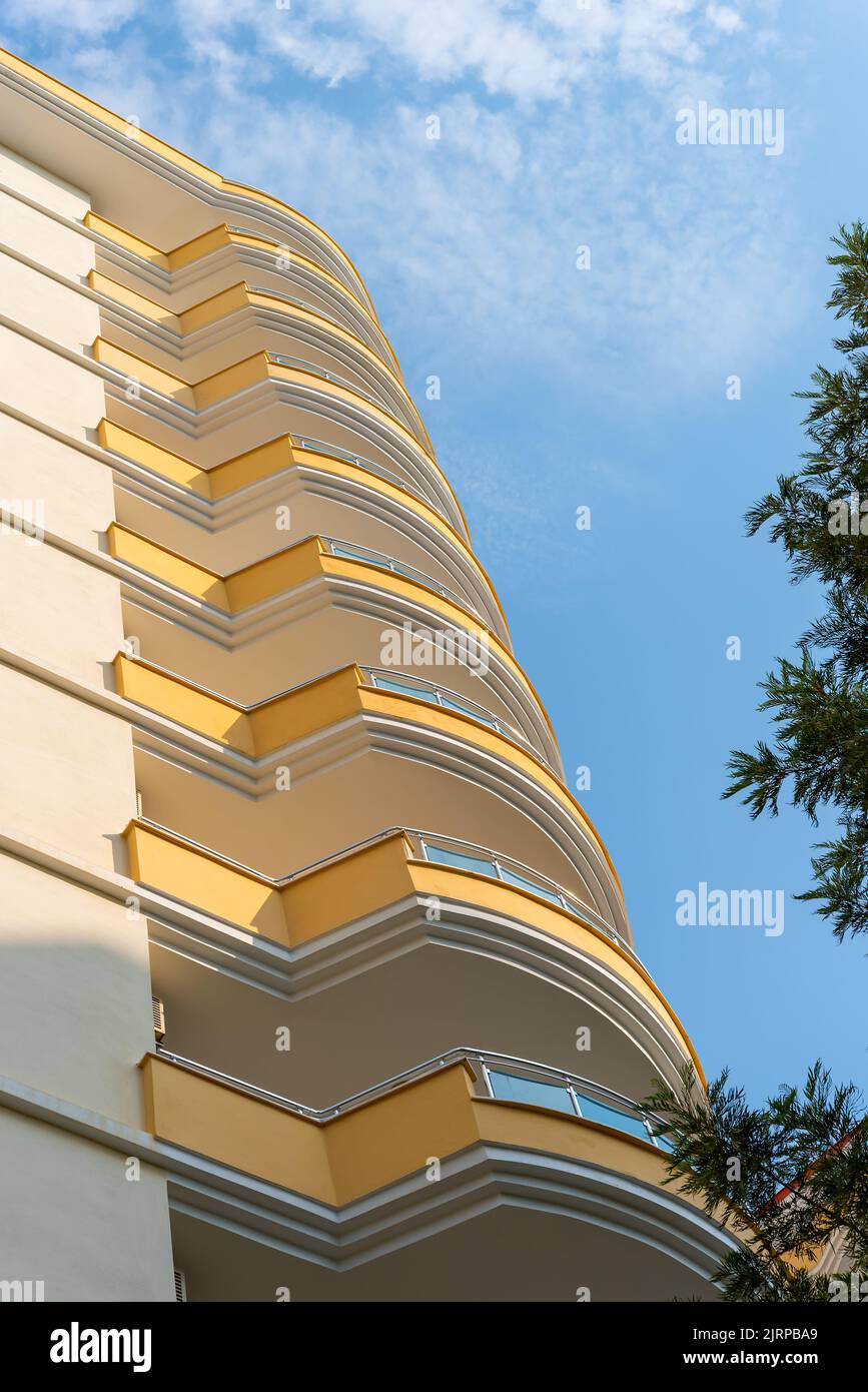 Low angle view of an apartment building with balconies. Residential ...