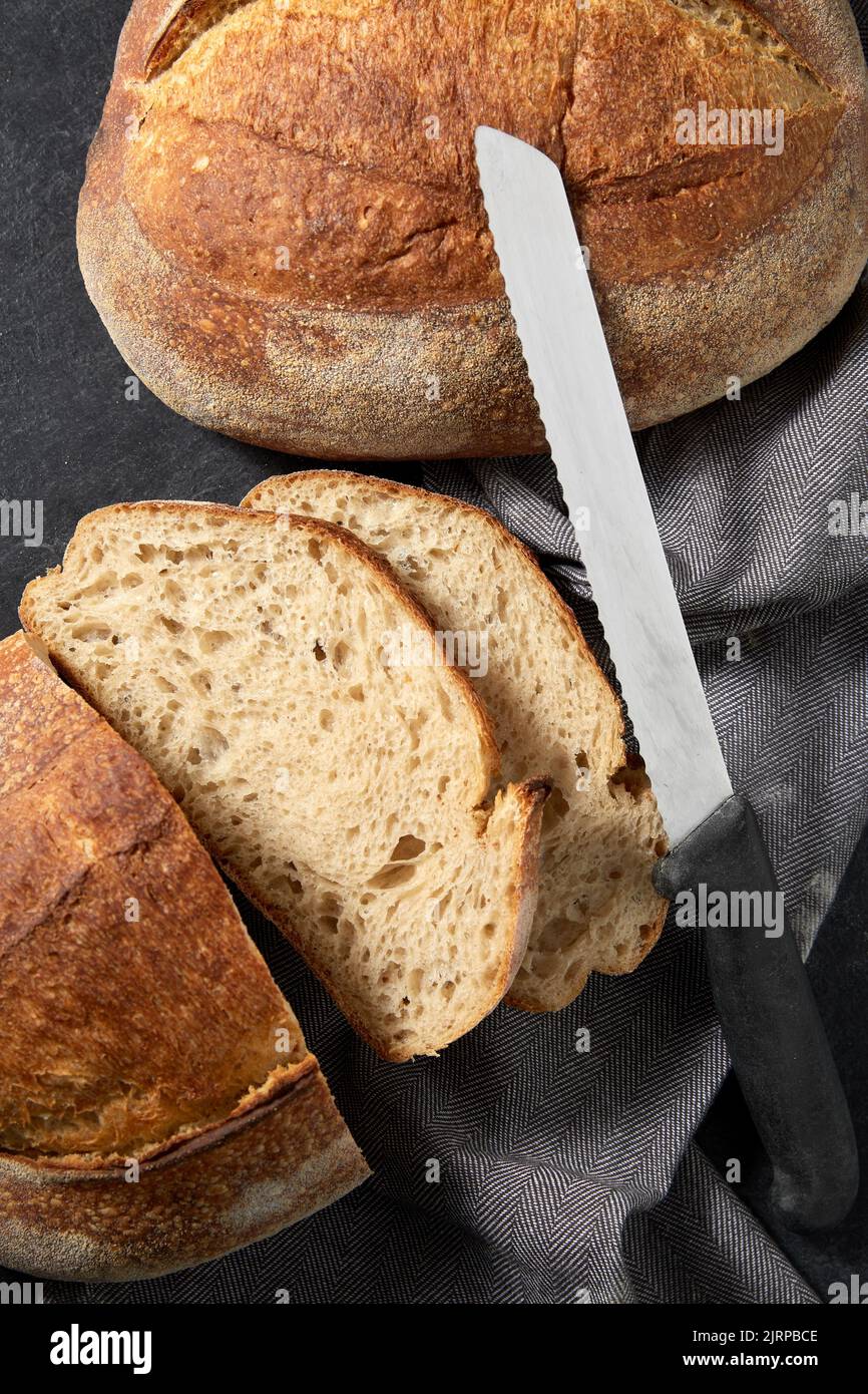 homemade craft bread with kitchen knife Stock Photo - Alamy