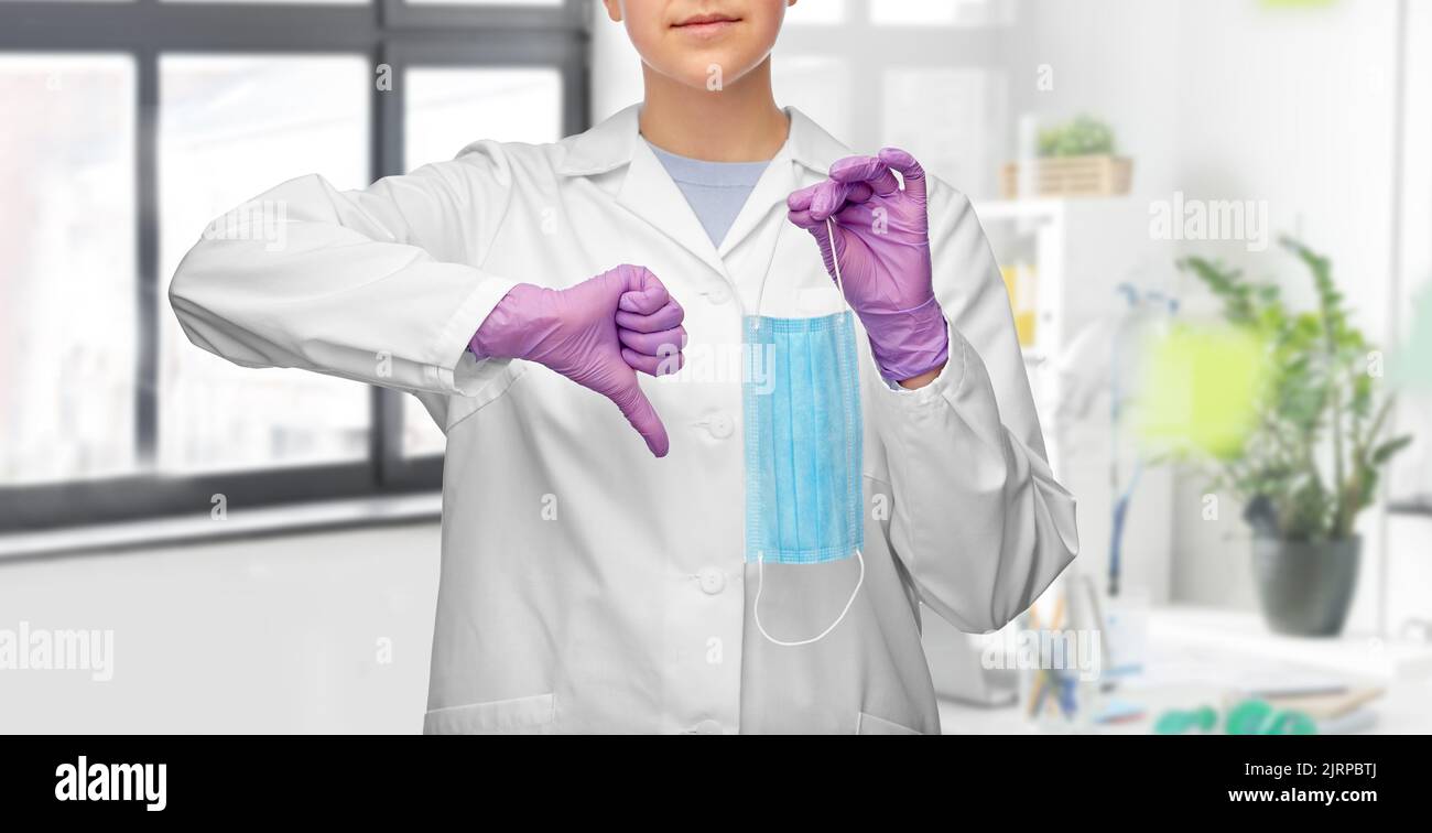 Thumbs down gesture female doctor hi-res stock photography and images ...