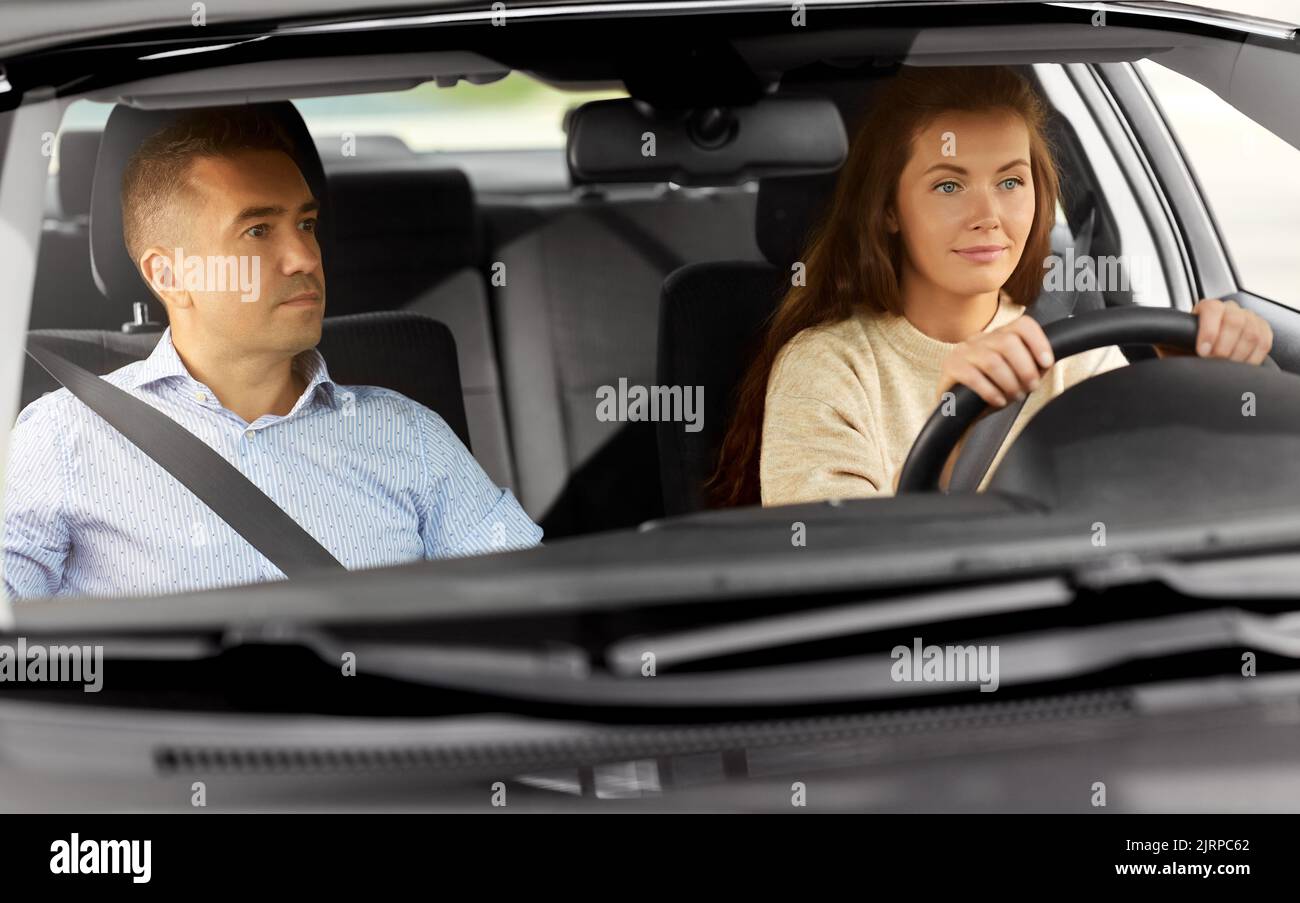 car driving school instructor teaching woman Stock Photo - Alamy