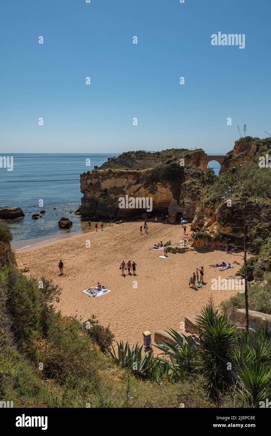 Sunny day on crowded beach hi-res stock photography and images - Alamy