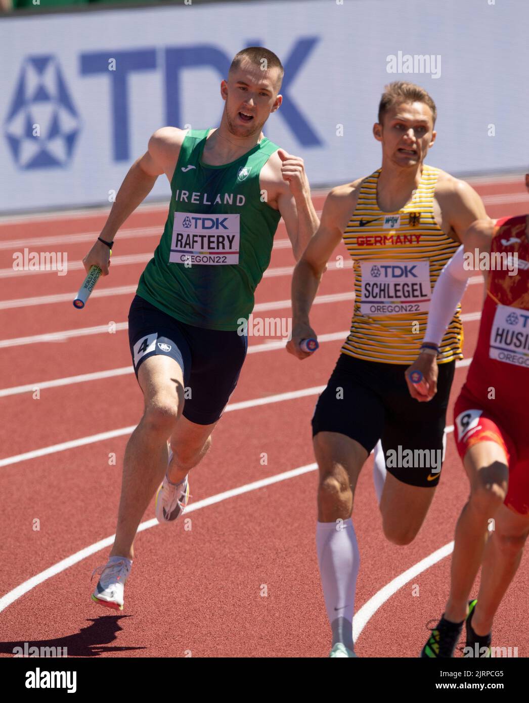 Jack Raftery and Marvin Schlegel competing in the mixed 4x100m relay ...