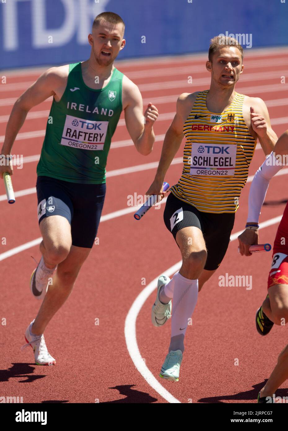 Jack Raftery and Marvin Schlegel competing in the mixed 4x100m relay ...
