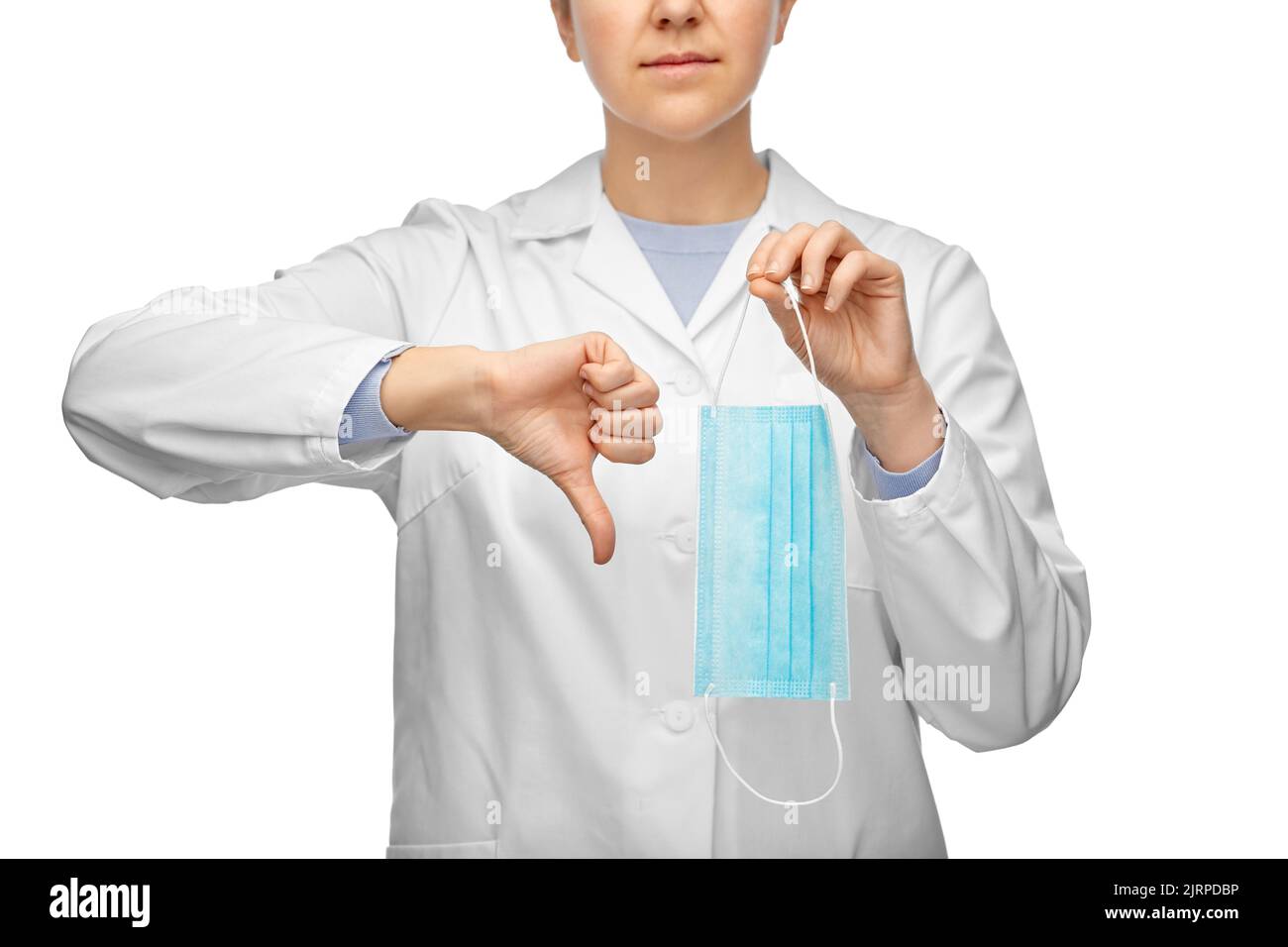 female doctor with mask showing thumbs down Stock Photo - Alamy