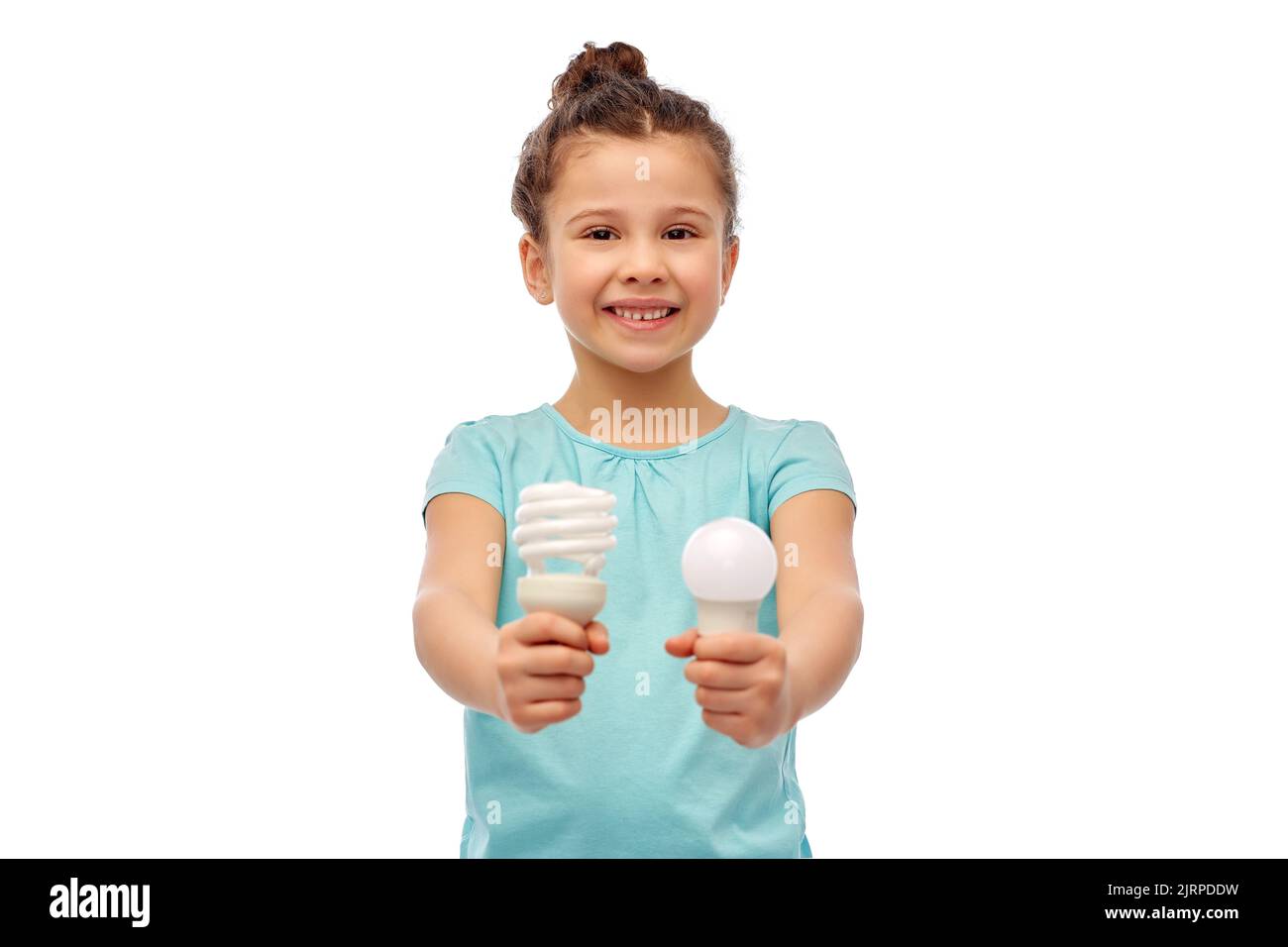 smiling girl comparing different light bulbs Stock Photo - Alamy