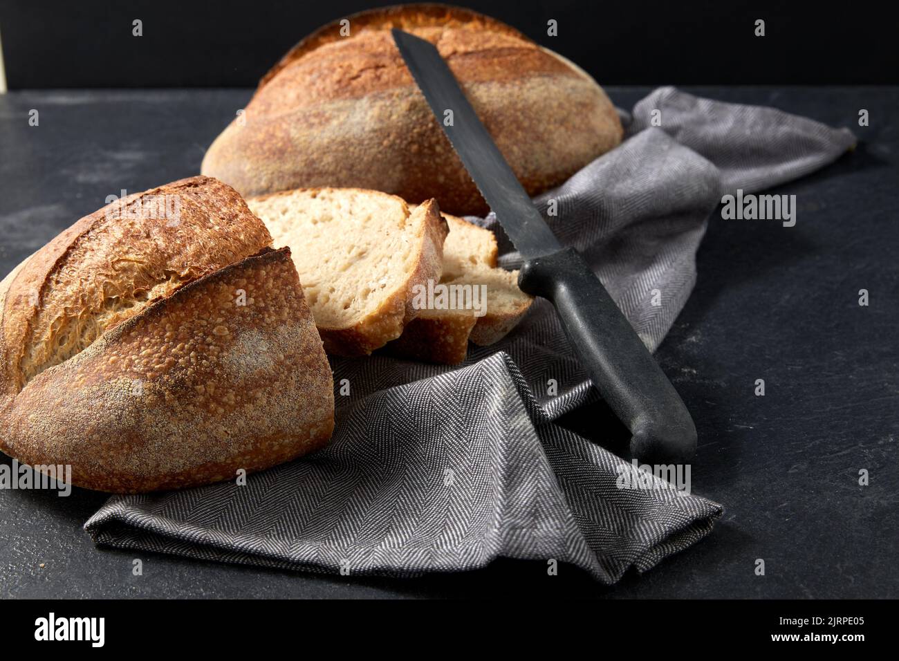 homemade craft bread with kitchen knife Stock Photo - Alamy