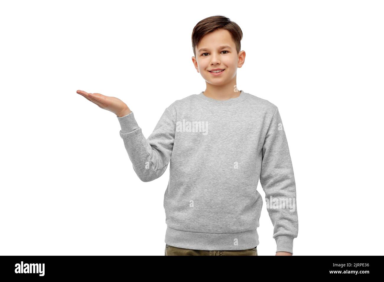 happy boy holding something imaginary on hand Stock Photo - Alamy