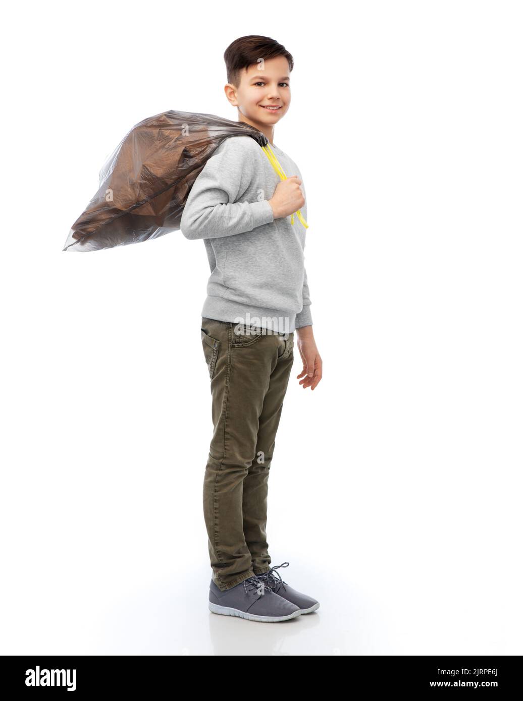 Boy holding trash bag hi-res stock photography and images - Alamy