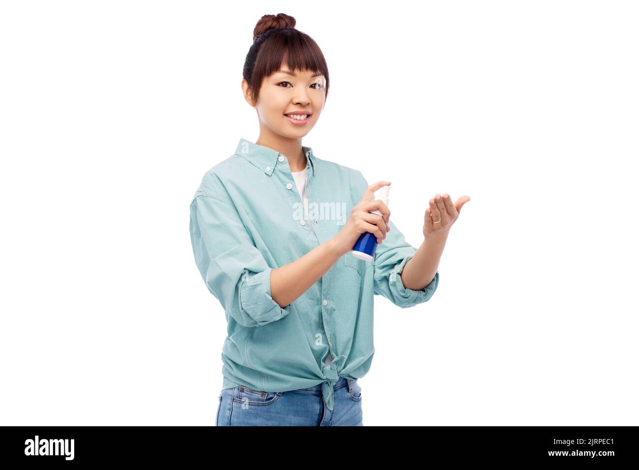 happy smiling asian woman using hand sanitizer Stock Photo - Alamy happy smiling asian woman using hand sanitizer Stock Photo - Alamy
