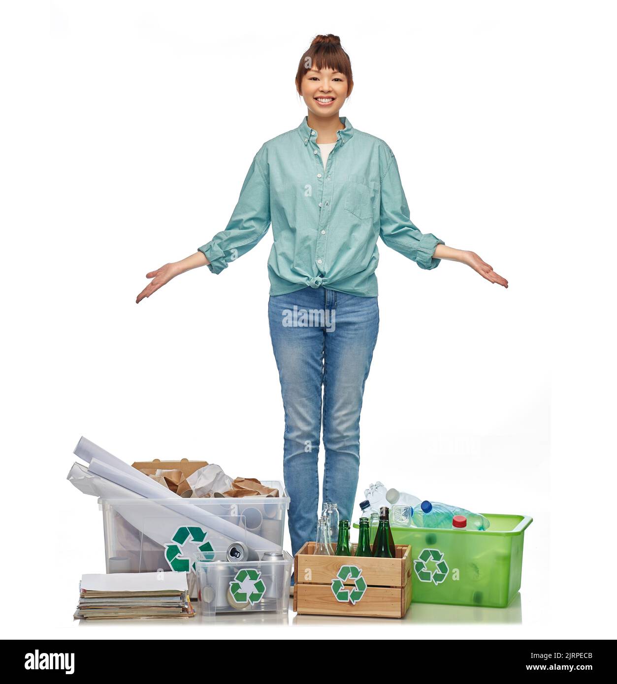 happy woman sorting paper, metal and plastic waste Stock Photo - Alamy