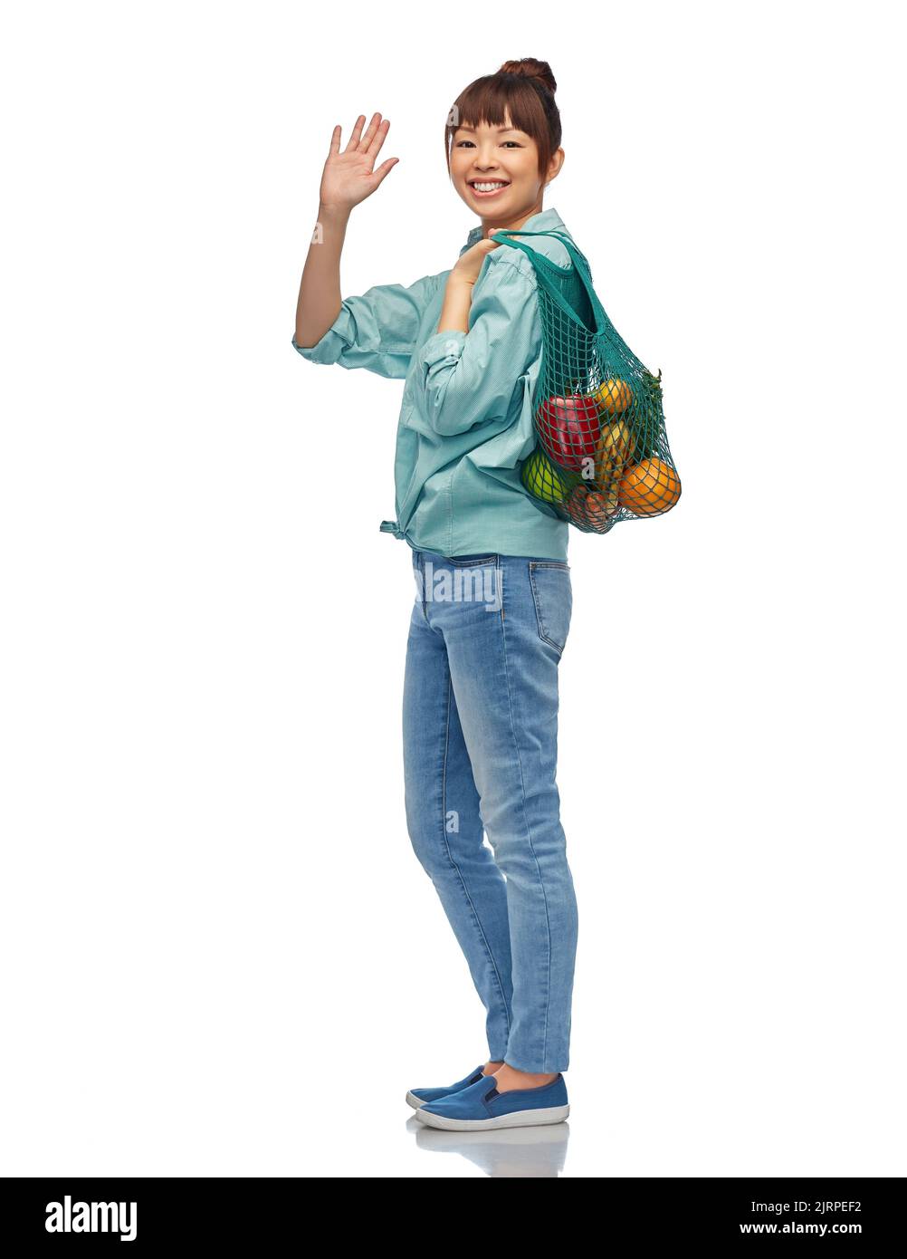 happy asian woman with food in reusable string bag Stock Photo - Alamy
