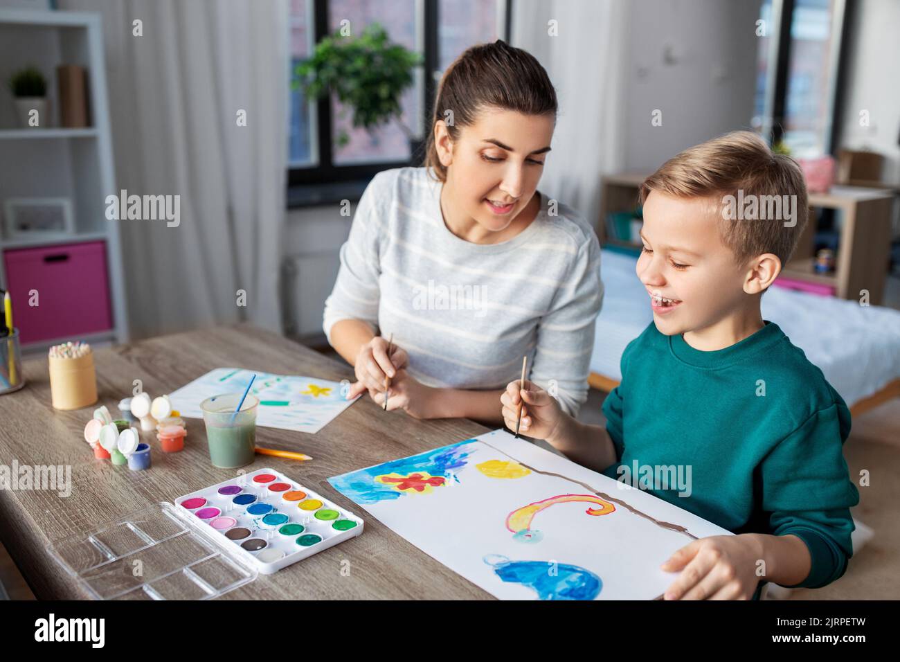 mother and son with colors drawing at home Stock Photo - Alamy