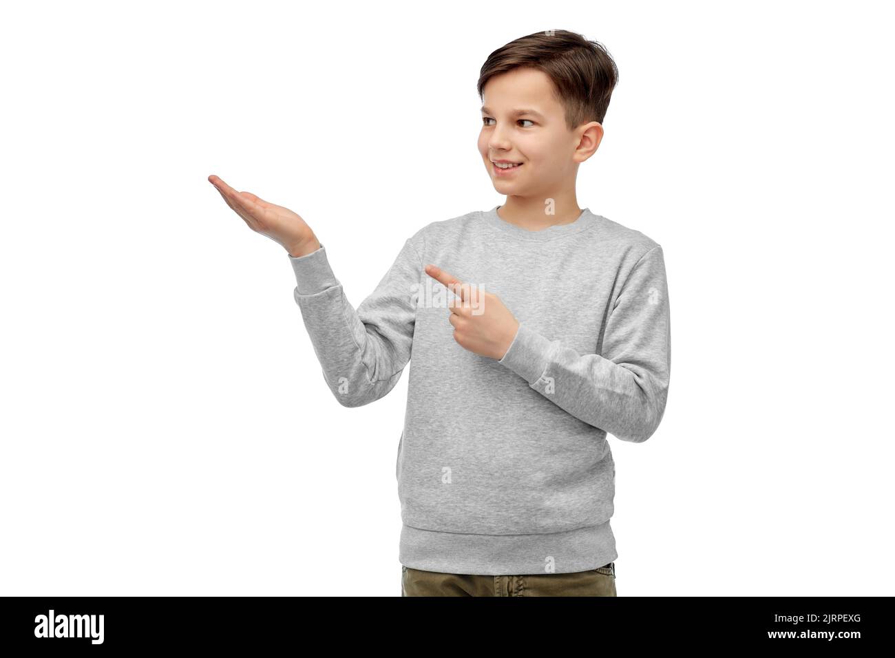 happy boy holding something imaginary on hand Stock Photo - Alamy
