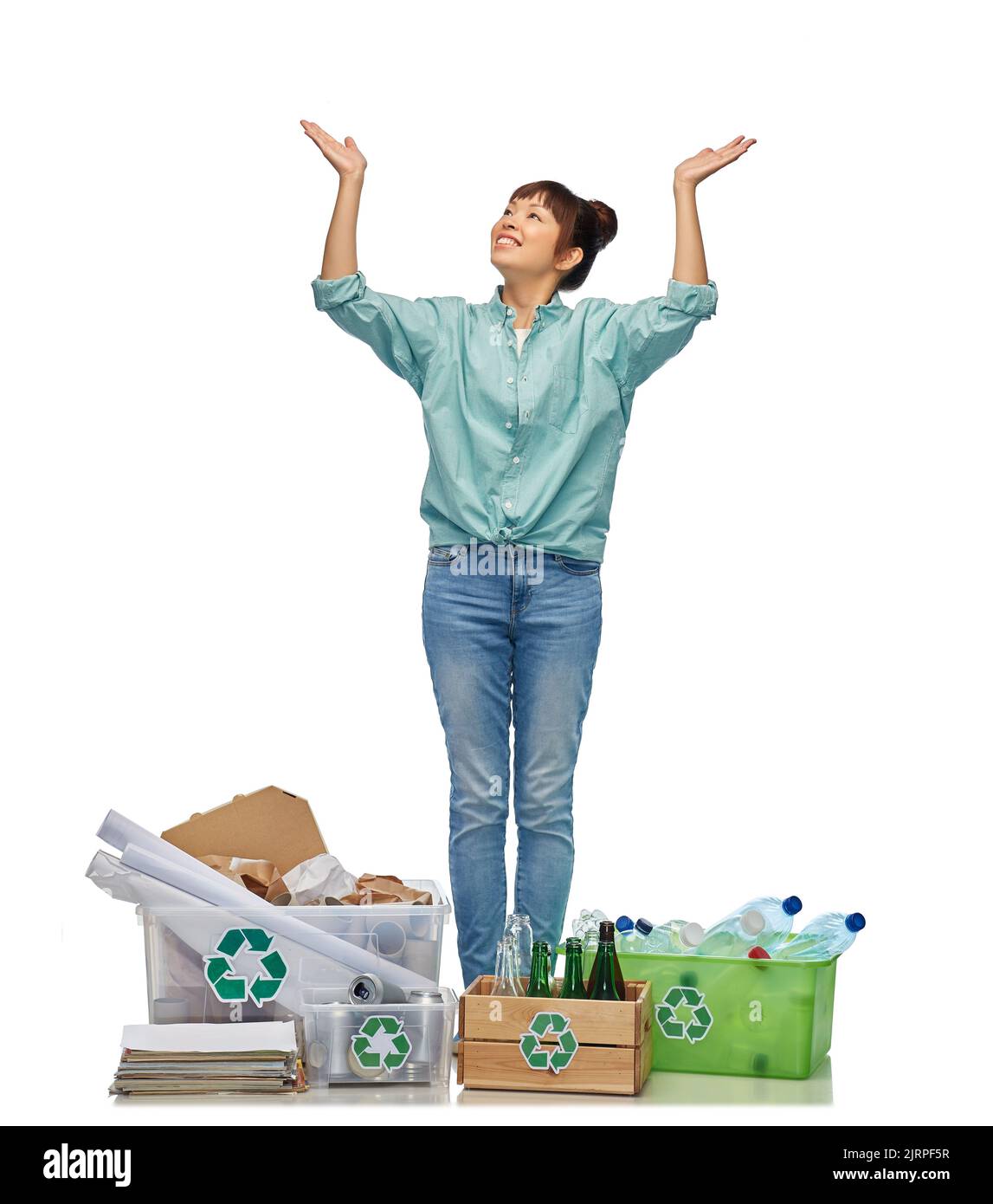 happy woman sorting paper, metal and plastic waste Stock Photo - Alamy
