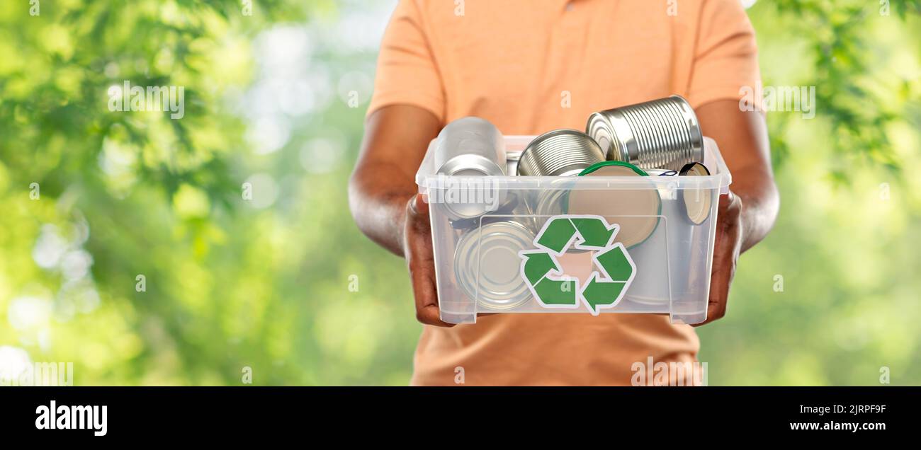 close up of young man sorting metallic waste Stock Photo - Alamy