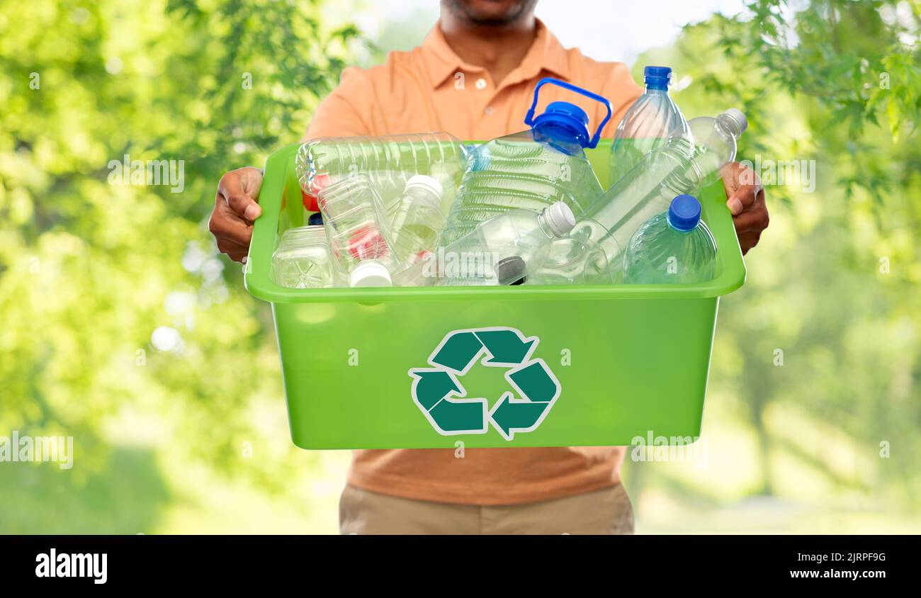 close up of young man sorting plastic waste Stock Photo - Alamy