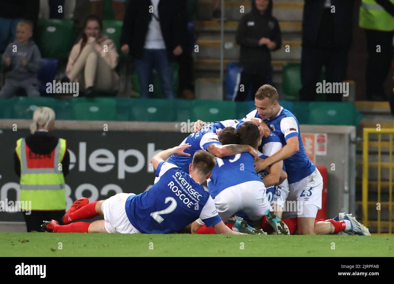 Linfield's Kyle McClean (obscured) celebrates scoring their side's ...
