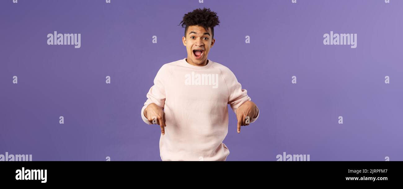 Portrait of handsome charismatic hispanic man inviting to subscribe ...