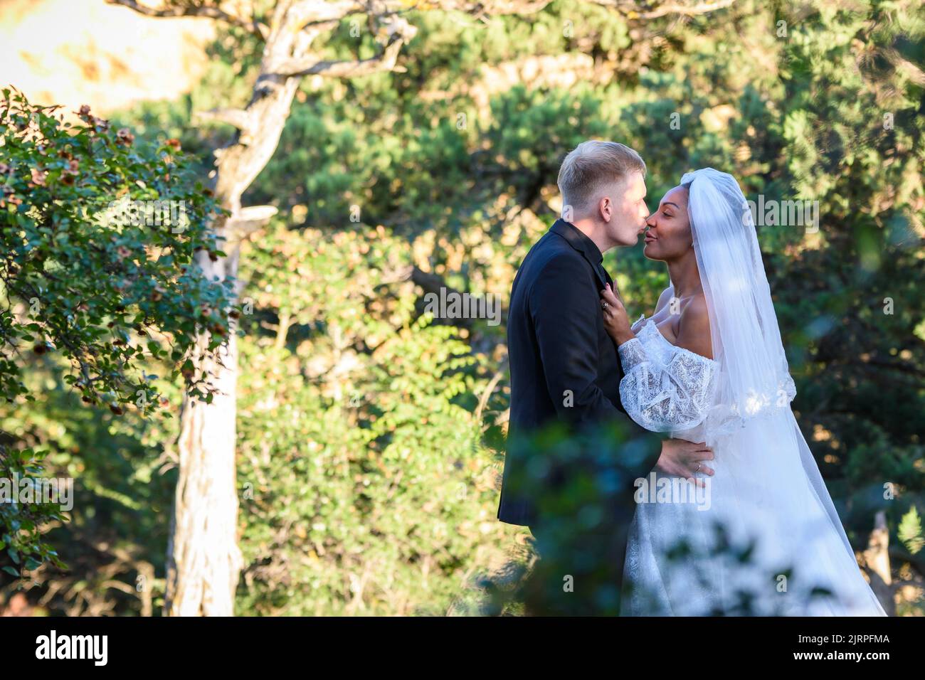 Interracial couple forest hi-res stock photography and images - Alamy