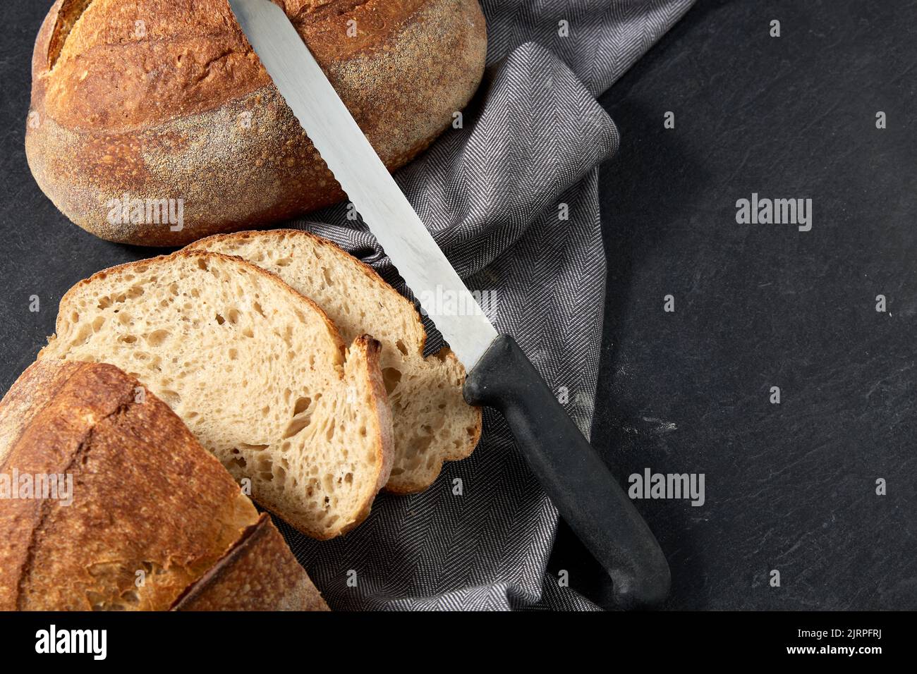 homemade craft bread with kitchen knife Stock Photo - Alamy