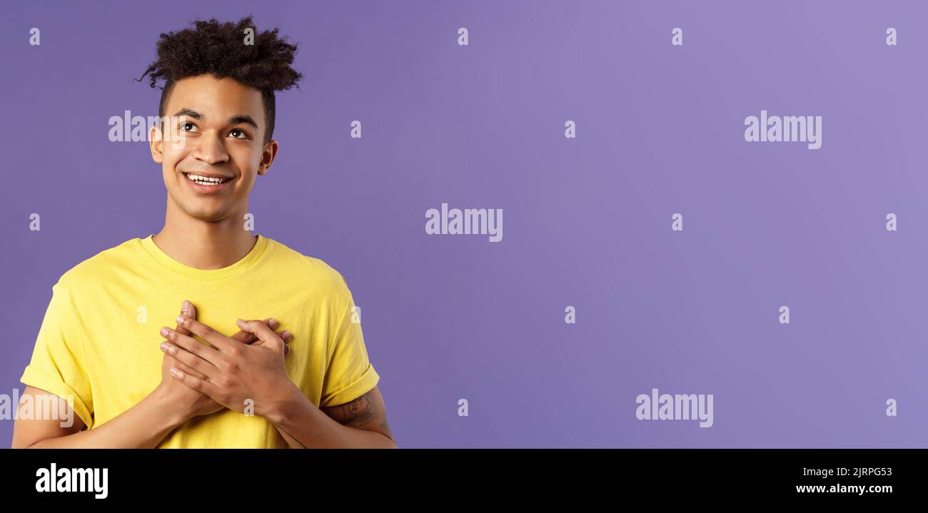 Close-up portrait of touched, romantic attractive man, hold hands on ...