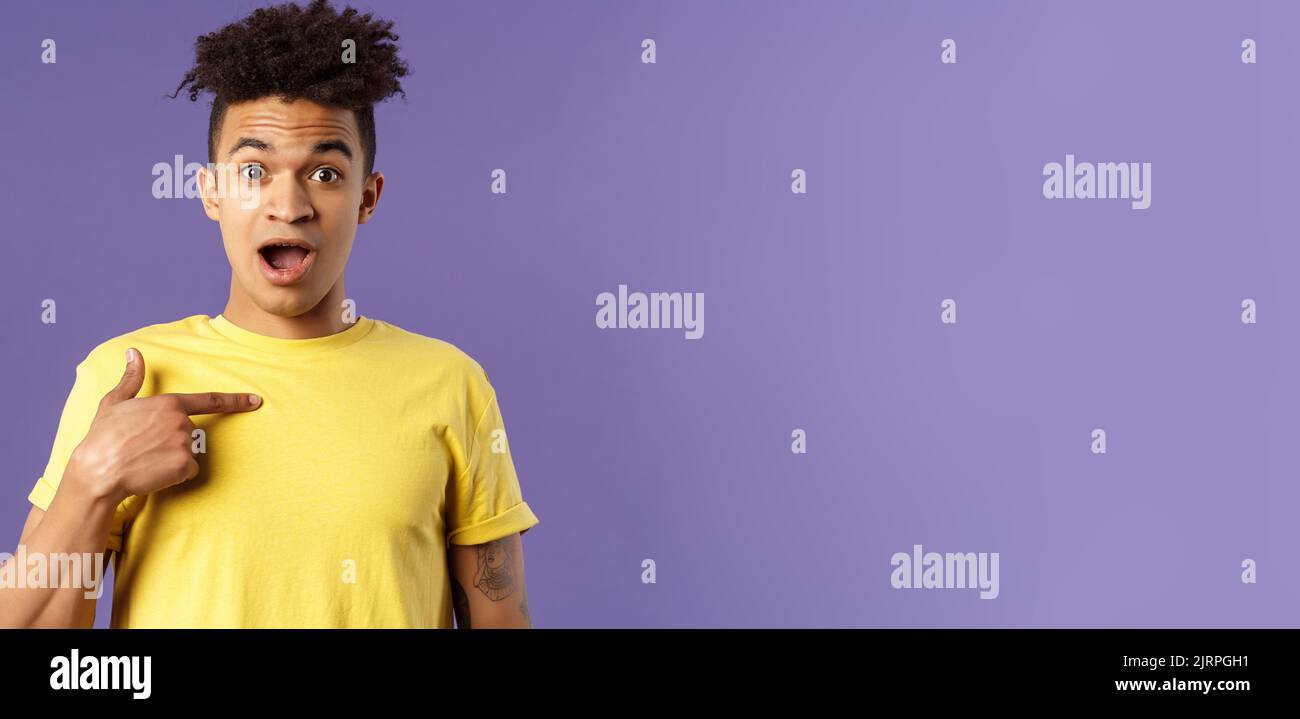 Who me, no way. Portrait of surprised, happy rejoicing young man ...