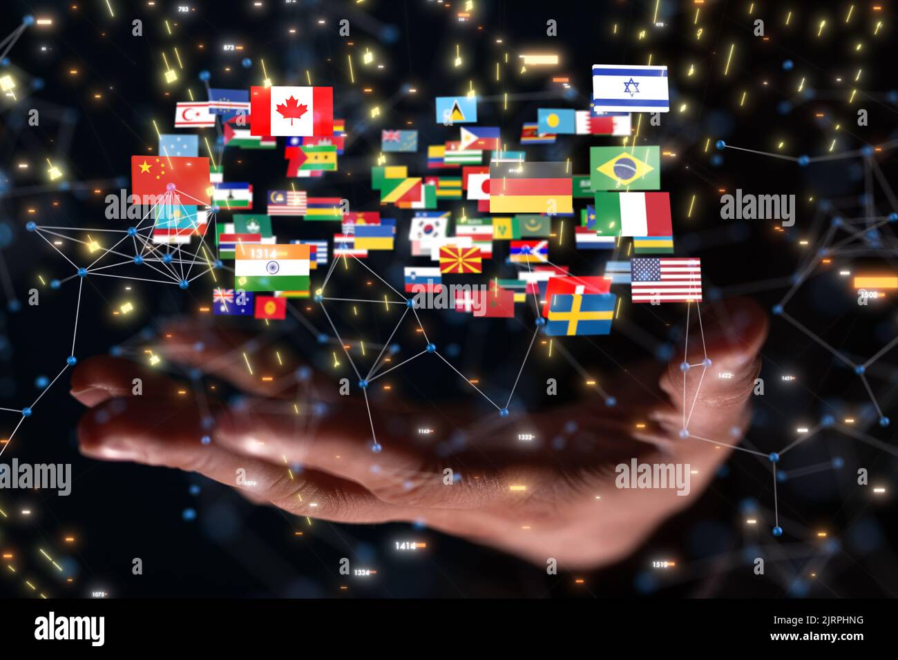 A 3d floating digital illustration of world flags over a hand- the ...
