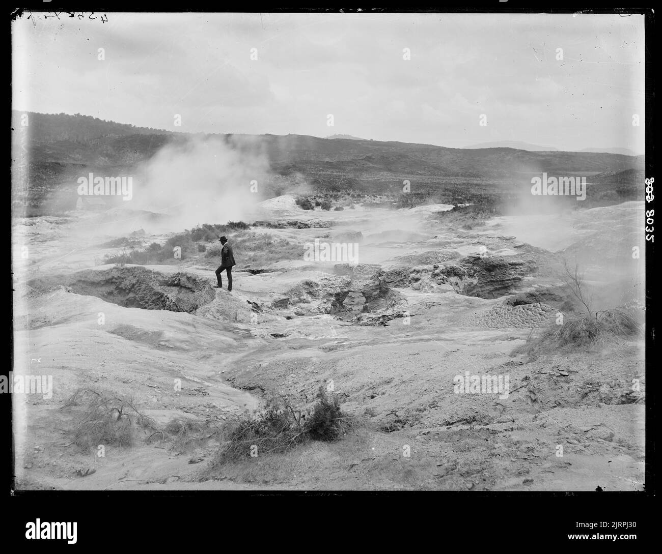 [Mud Pools with man, Tikitere], New Zealand, by Burton Brothers Stock ...