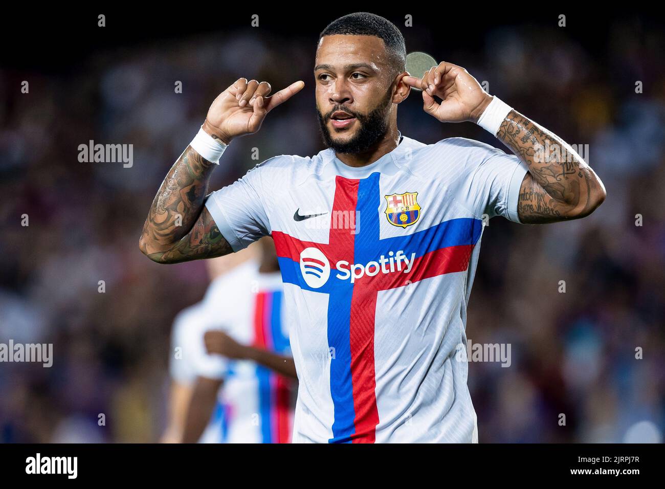 BARCELONA, SPAIN - AUGUST 24: Memphis Depay of FC Barcelona celebrates ...