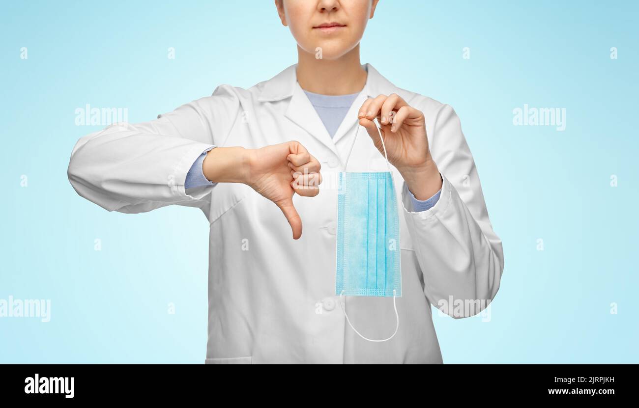 Thumbs down gesture female doctor hi-res stock photography and images ...