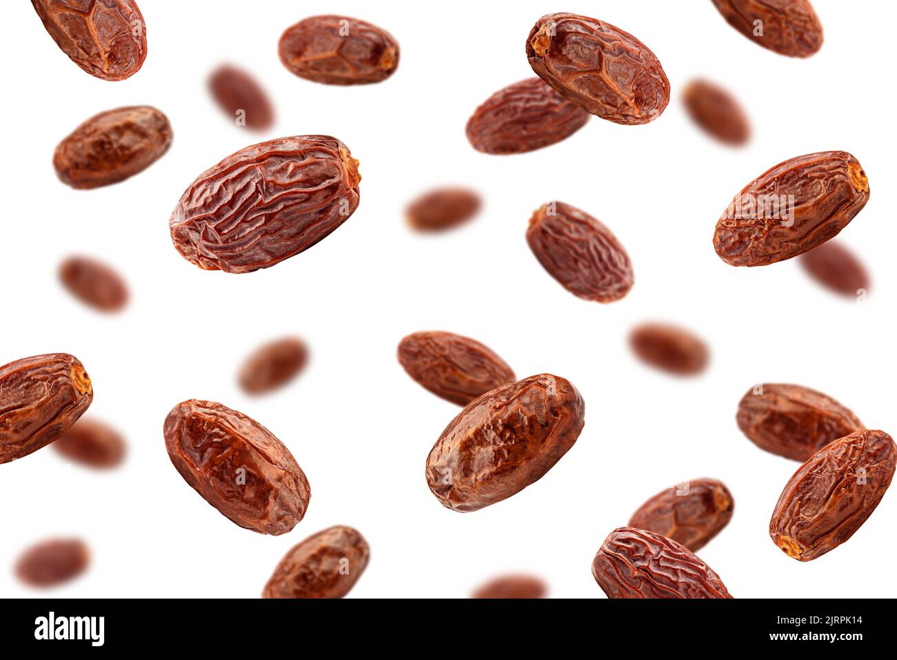 Falling Dates isolated on white background, selective focus Stock Photo ...