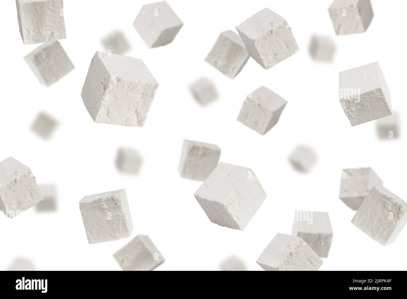 Falling Feta, Greek cheese cubes, isolated on white background ...