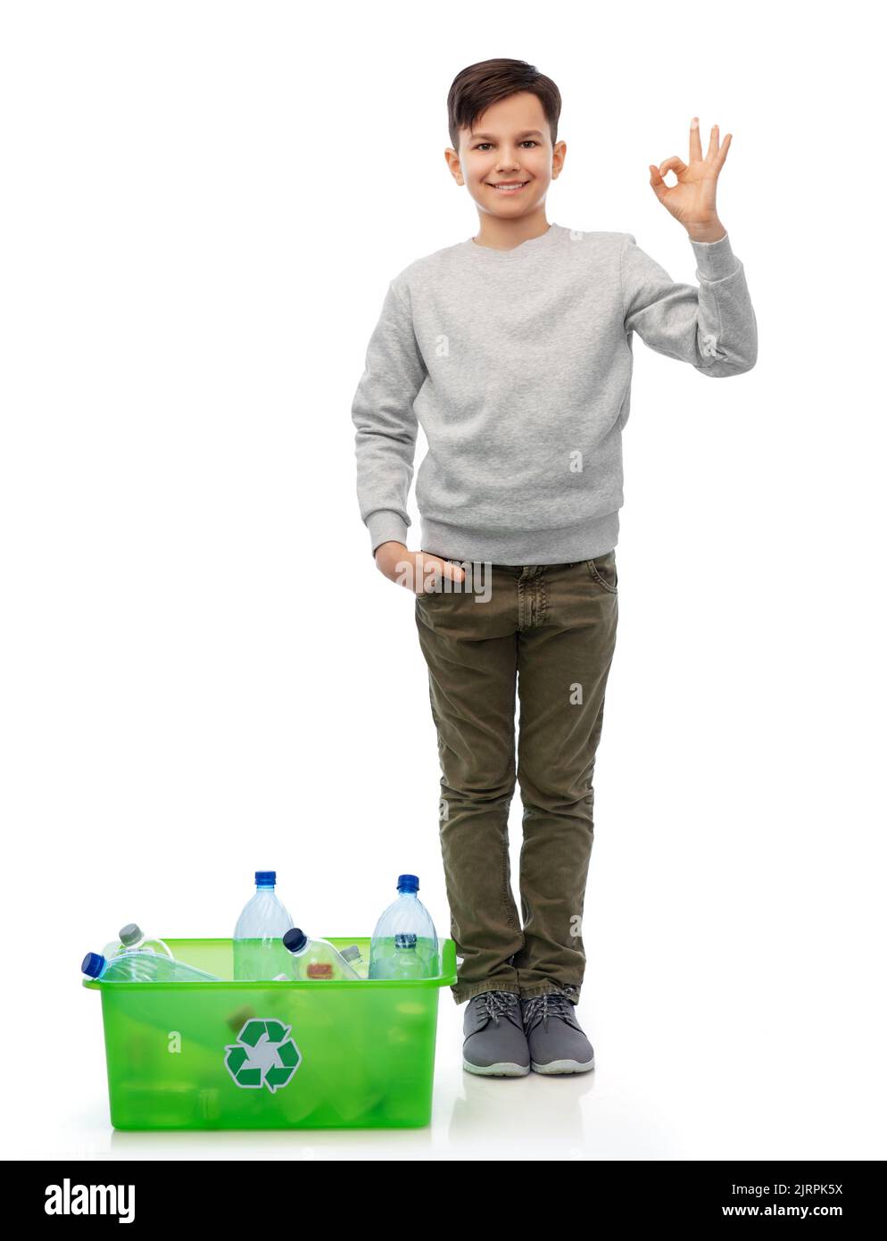 smiling boy sorting plastic waste Stock Photo - Alamy