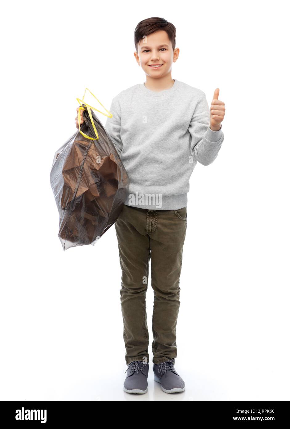 Boy holding trash bag hi-res stock photography and images - Alamy